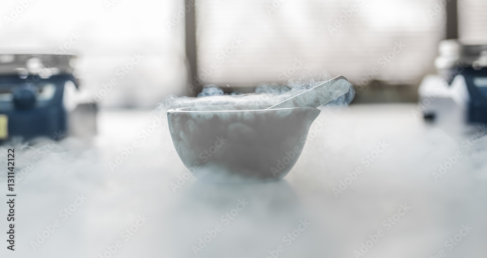 Laboratory experiment with liquid nitrogen in laboratory mortar Stock ...