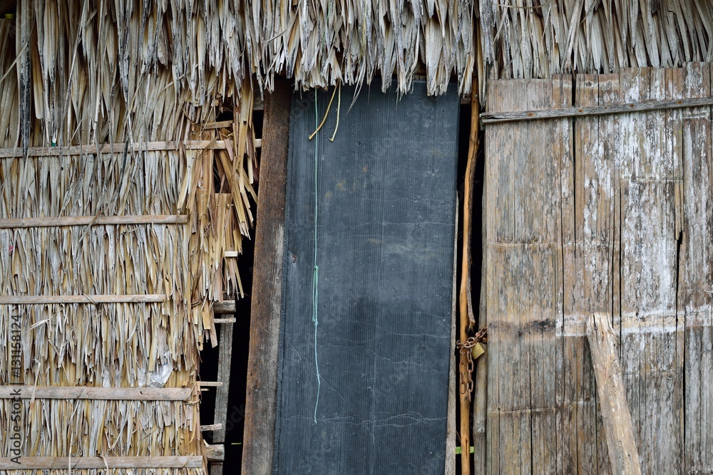 grass wall of the house in the village Stock Photo | Adobe Stock