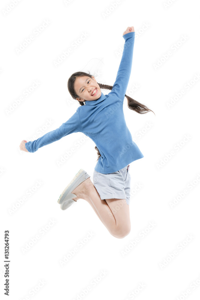 Portrait of happy little Asian child girl jumping isolated on white ...