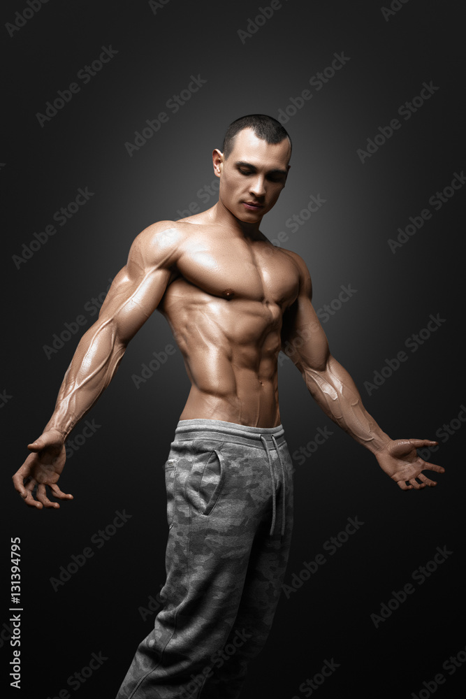 Strong Athletic Man Fitness Model Torso showing big muscles Stock Photo ...