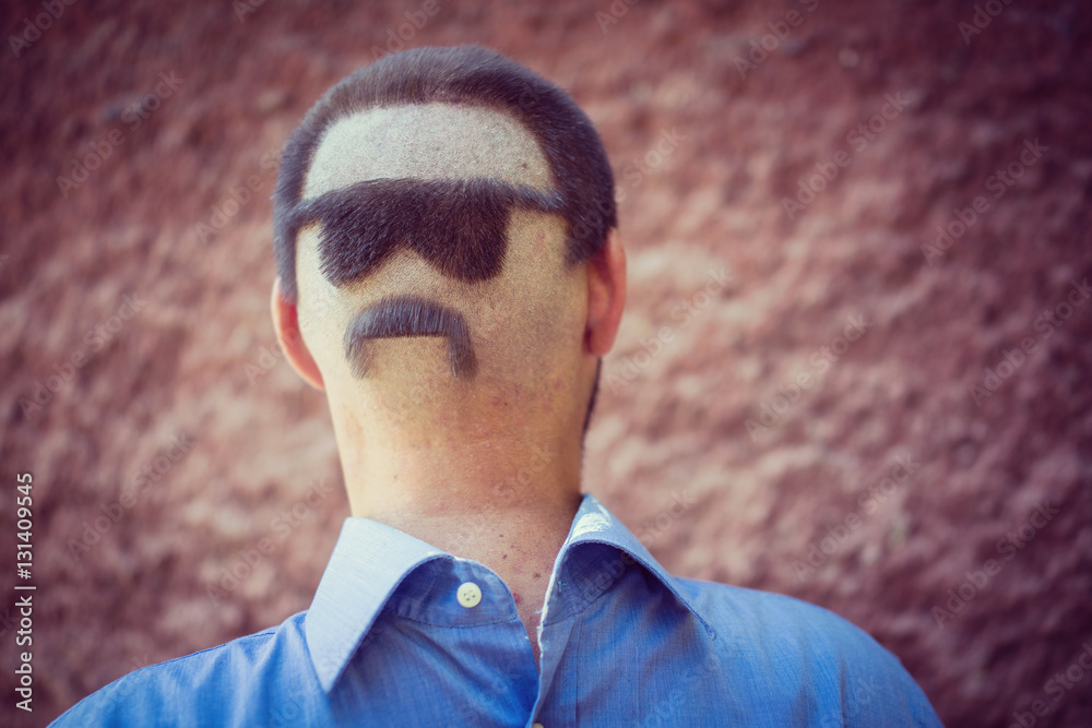 Man closeup portrait funny made on his back of head hair Stock-Foto ...