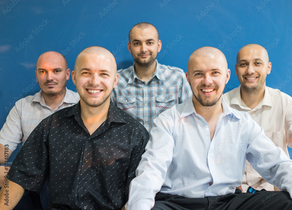 Group portrait of young bald men Stock Photo | Adobe Stock