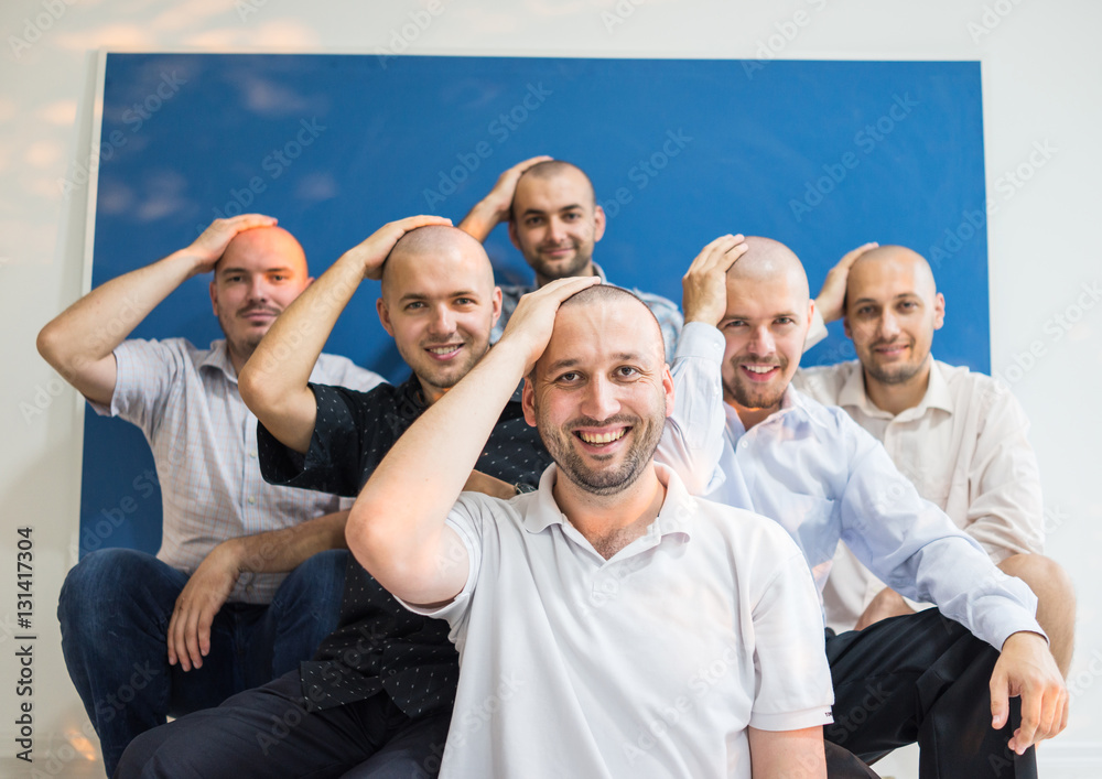 Group portrait of young bald men Stock Photo | Adobe Stock