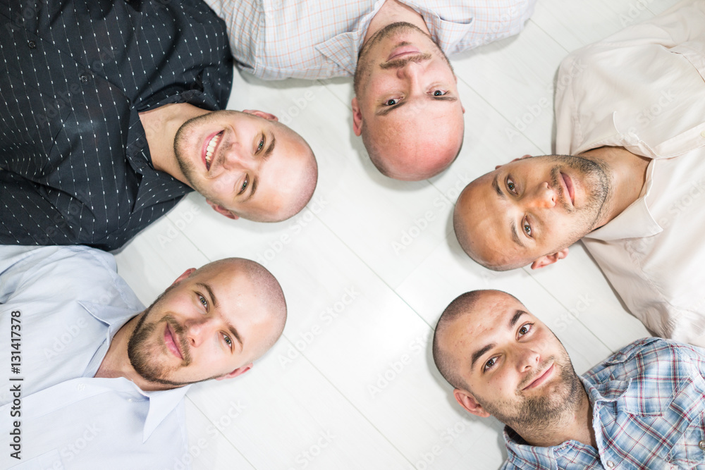 Group portrait of young bald men Stock Photo | Adobe Stock