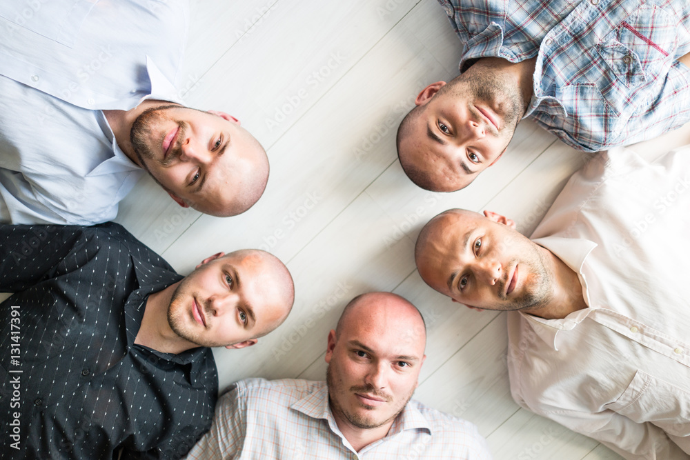 Group portrait of young bald men Stock Photo | Adobe Stock