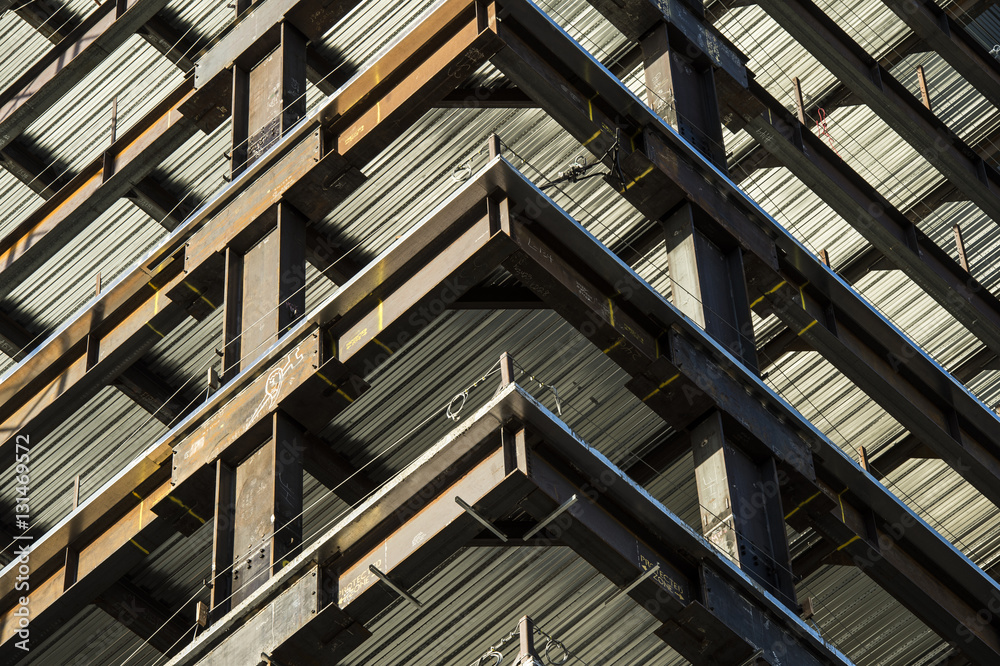 corner detail of high rise building under construction showing steel ...