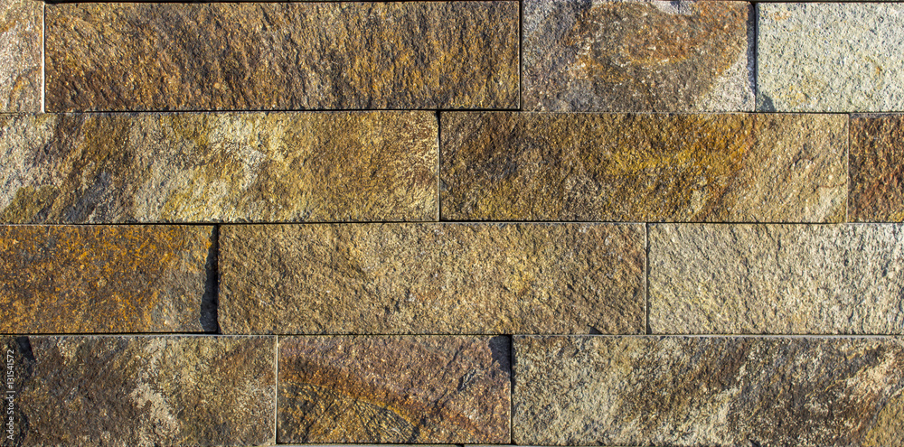 yellow natural stone facade, wall tiles Stock Photo | Adobe Stock