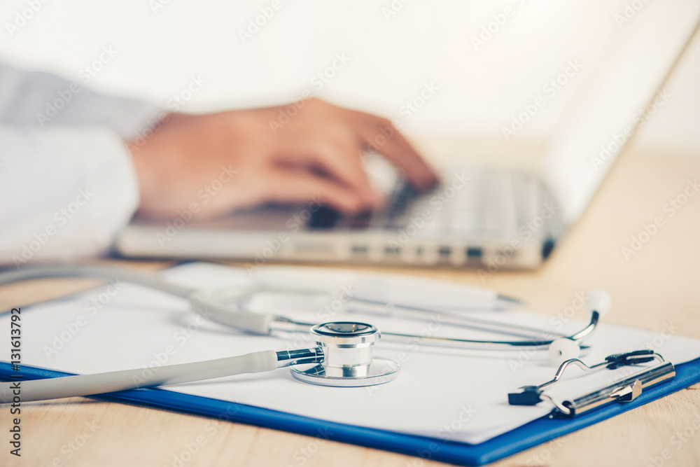 Medicine doctor's working table. Focus on stethoscope. Stock Photo ...
