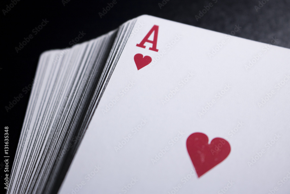 poker card stack deck on dark black background Stock Photo | Adobe Stock
