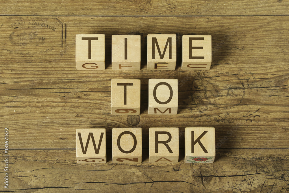 time to work text on cubes on wooden background Photos | Adobe Stock