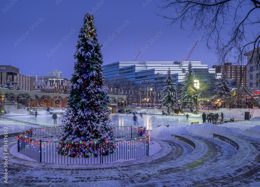 Families ice skating at Olympic in Calgary, Alberta. The ice skating at ...