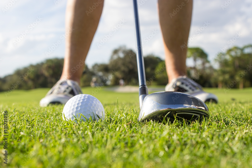 Beginner Hitting Golf Ball Stock Photo | Adobe Stock