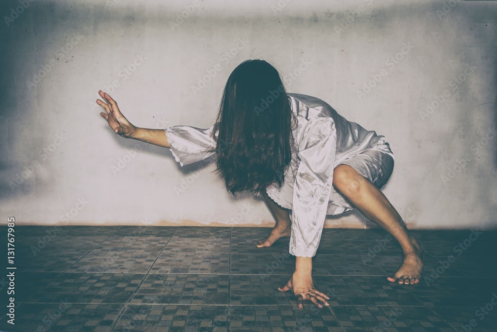 Mysterious Woman, Horror scene of scary ghost woman on white wall with ...