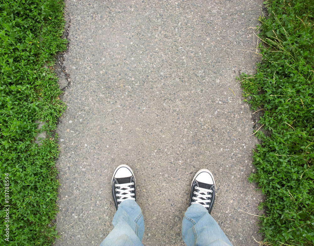 Feet on the pavement. Stock Photo | Adobe Stock