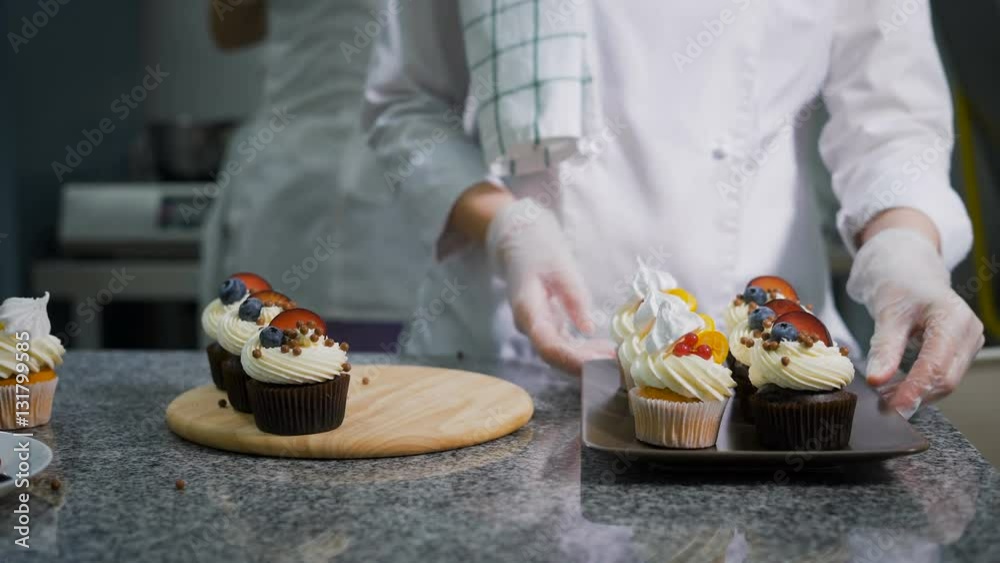 The process of how to cook pastry chef puts on a small metallic tray of ...