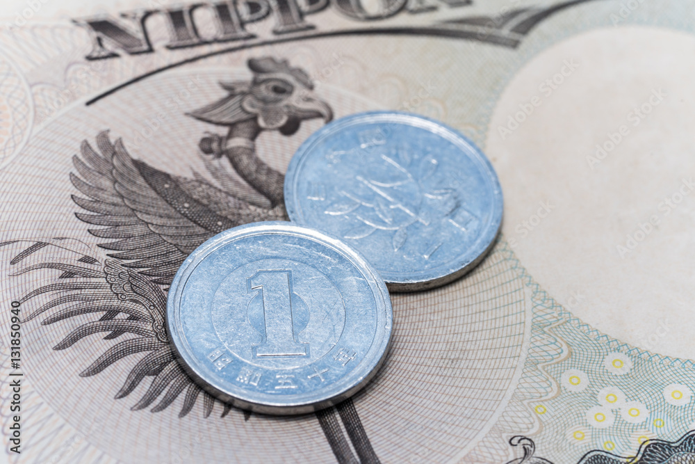 Business and finance concept : Close up of 1 yen japan coin on currency ...