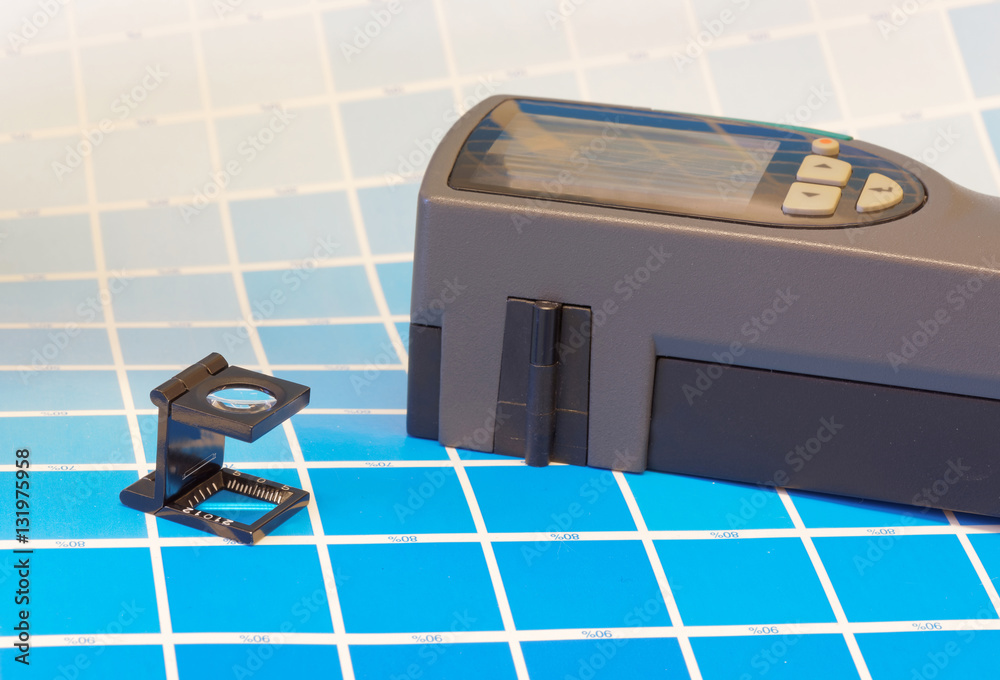 Scanning densitometer and a magnifyer on a leaf of the test prin Stock ...