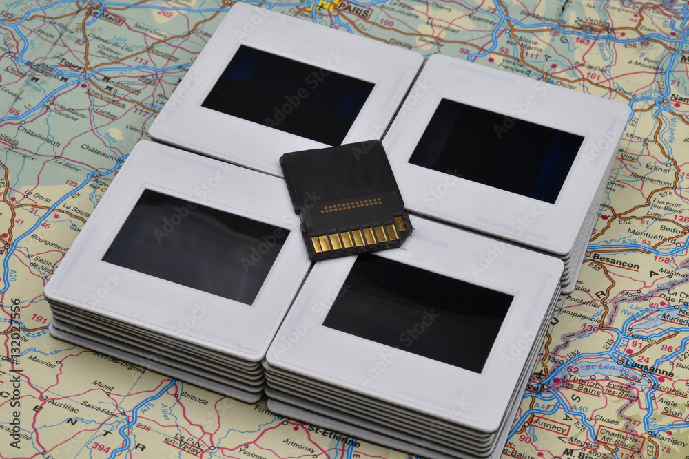 Old and new photography: memory card and vintage amateur slides on a ...