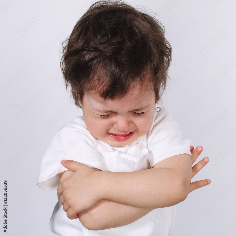 cute crying boy on white background Stock Photo | Adobe Stock