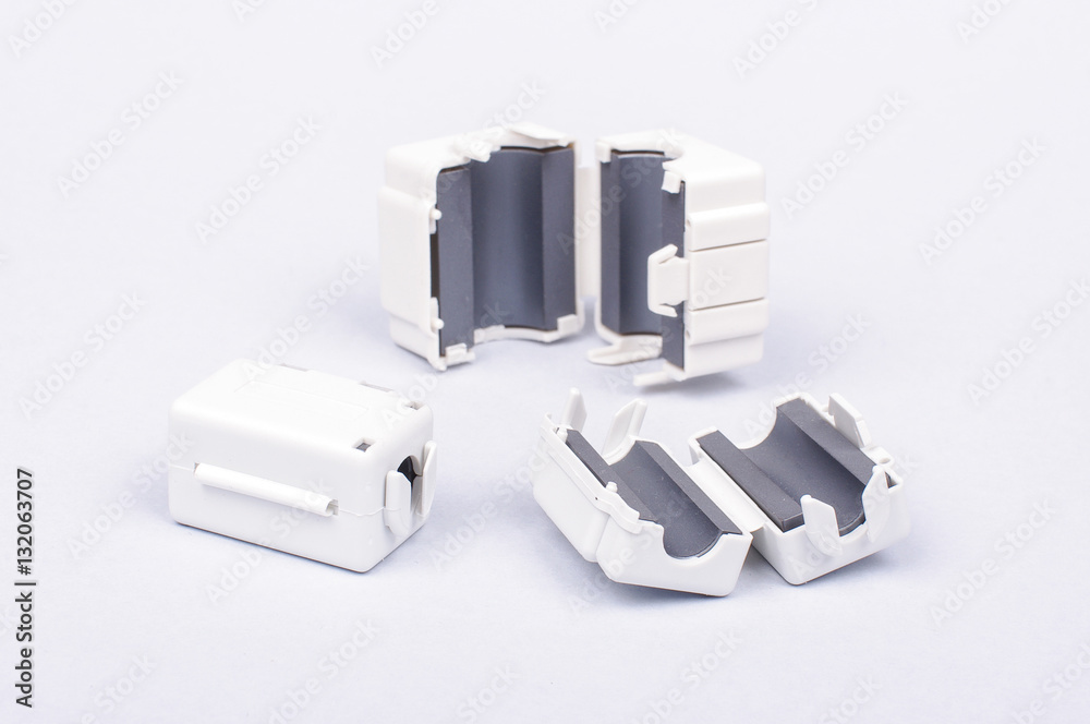 Snap on ferrite for EMC suppression Stock Photo | Adobe Stock