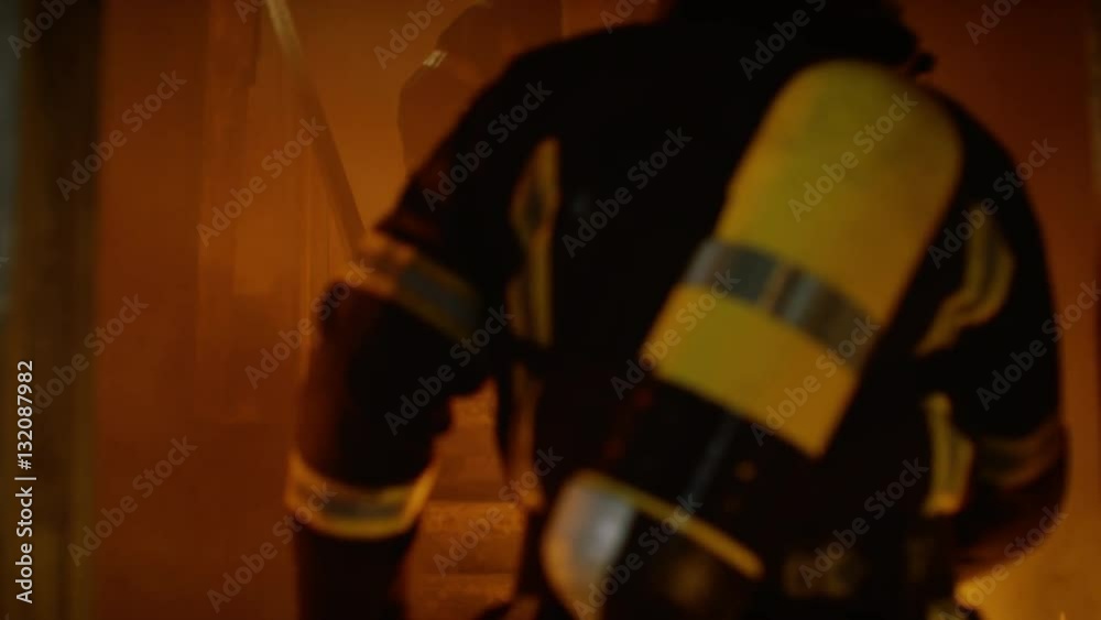 Two Brave Firefighters Enter Into Open Doors and Run Up The Burning ...