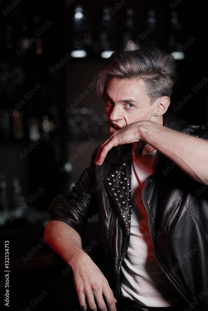 Man wiping blood off his face Stock Photo | Adobe Stock