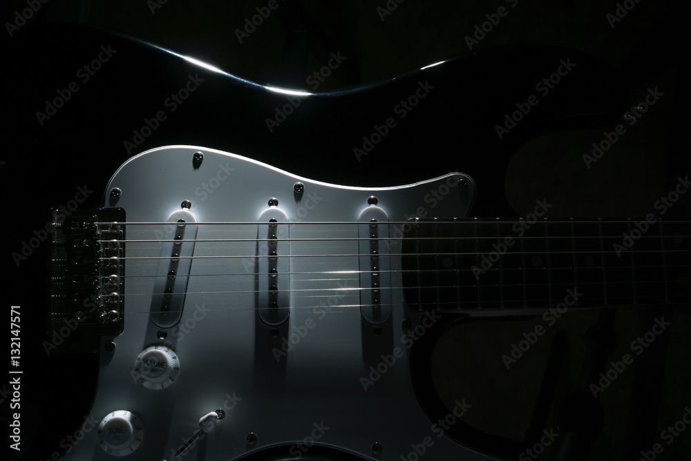 Electric guitar in the dark Stock Photo | Adobe Stock