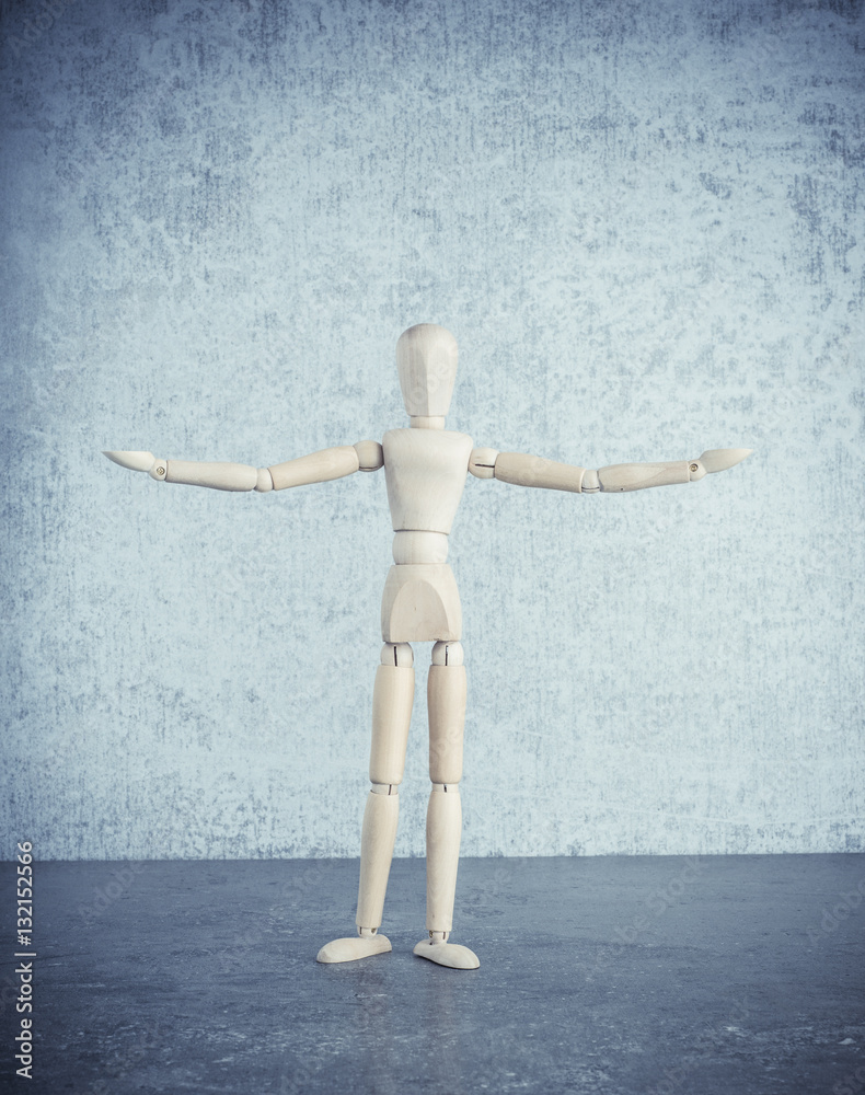 Welcome gesture with open arms by wooden figure. Friendly symbol of ...