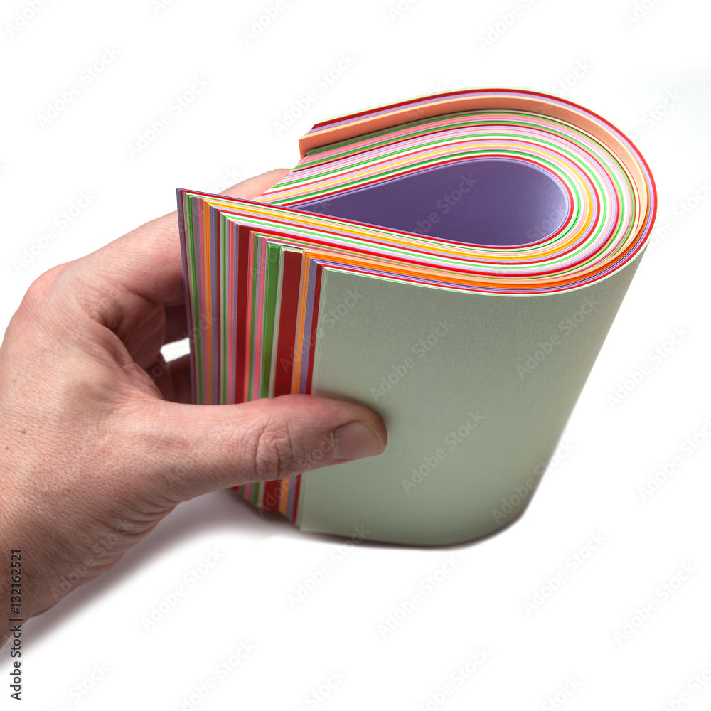 hand holding color paper Stock Photo | Adobe Stock