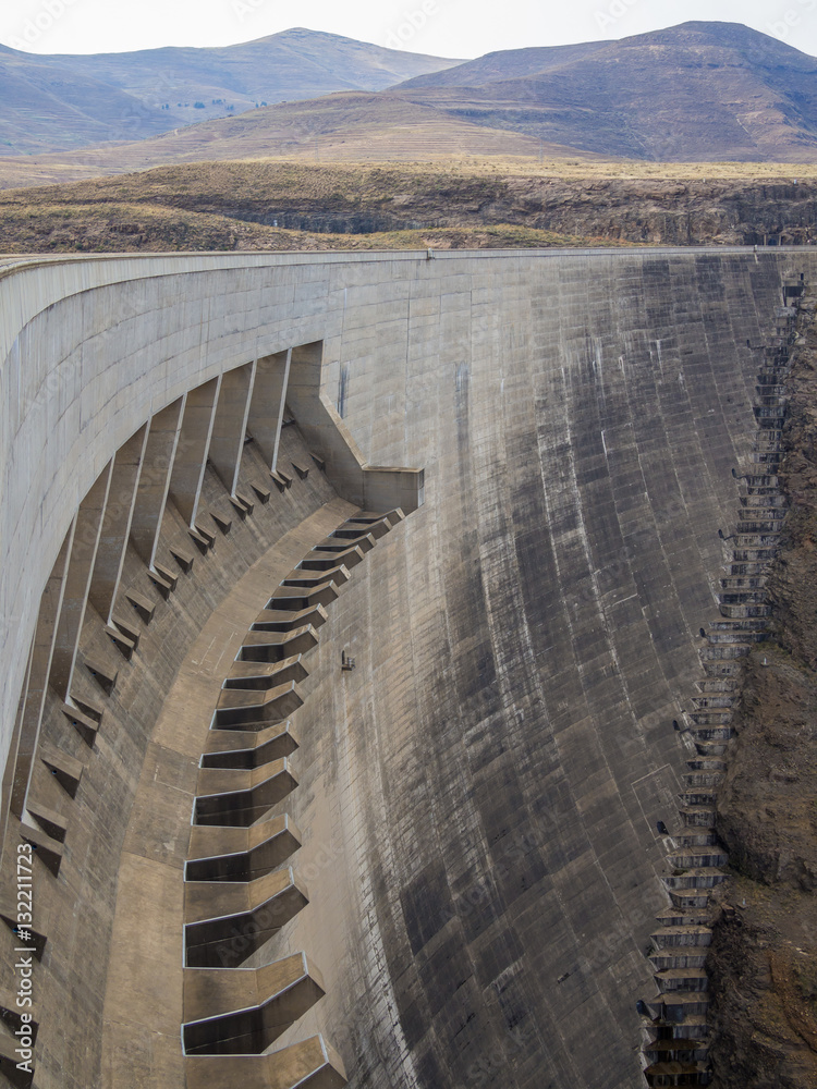Concrete dam wall and overflow of impressive Katse Dam hydroelectric ...