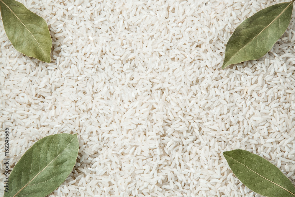 Rice background with bay leaves. Healthy eating and lifestyle. Stock ...