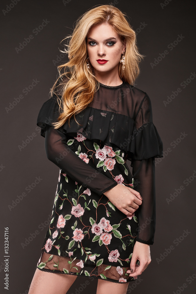 Portrait of beautiful elegant woman in fashionable dress Stock Photo ...