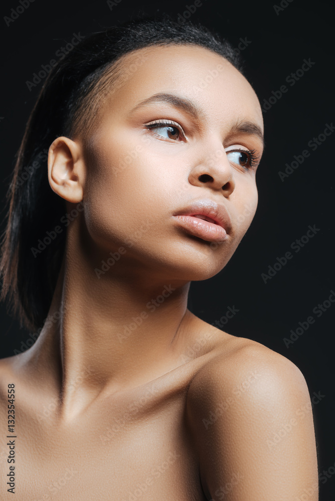 Cute nice woman craning her neck Stock Photo | Adobe Stock