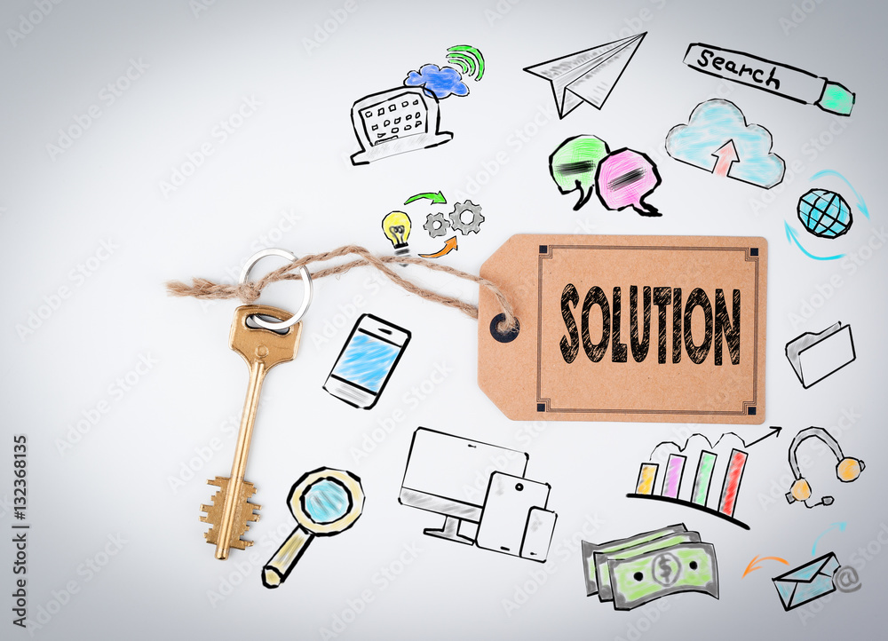 Solution. Key and a note on a white background Photos | Adobe Stock