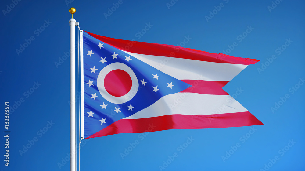 Ohio (U.S. state) flag waving against clear blue sky, close up ...