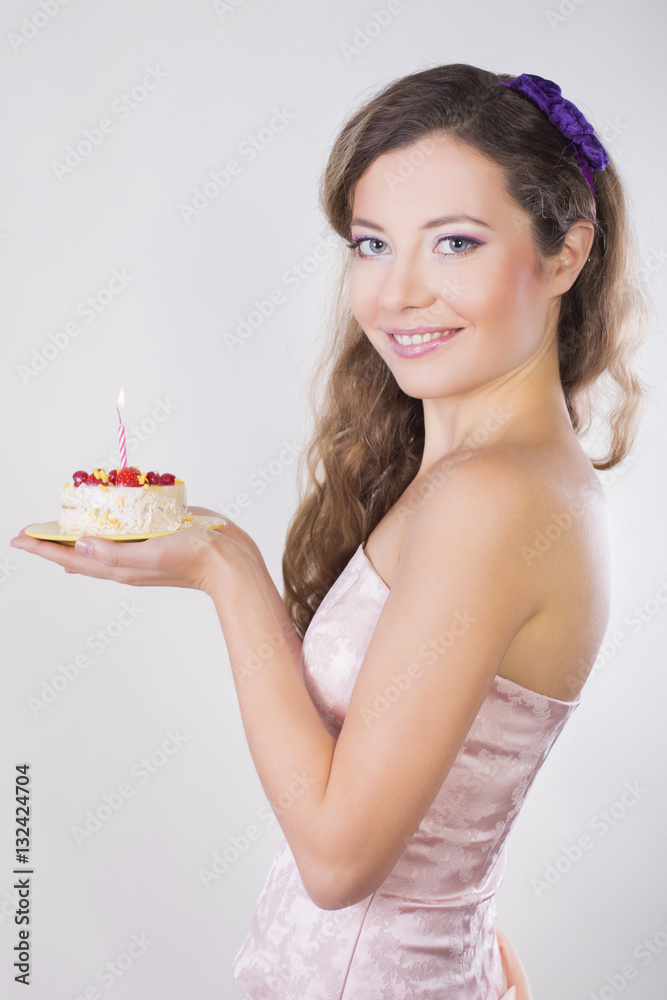Beautiful happy girl propose a birthday cake with candle Stock Photo ...