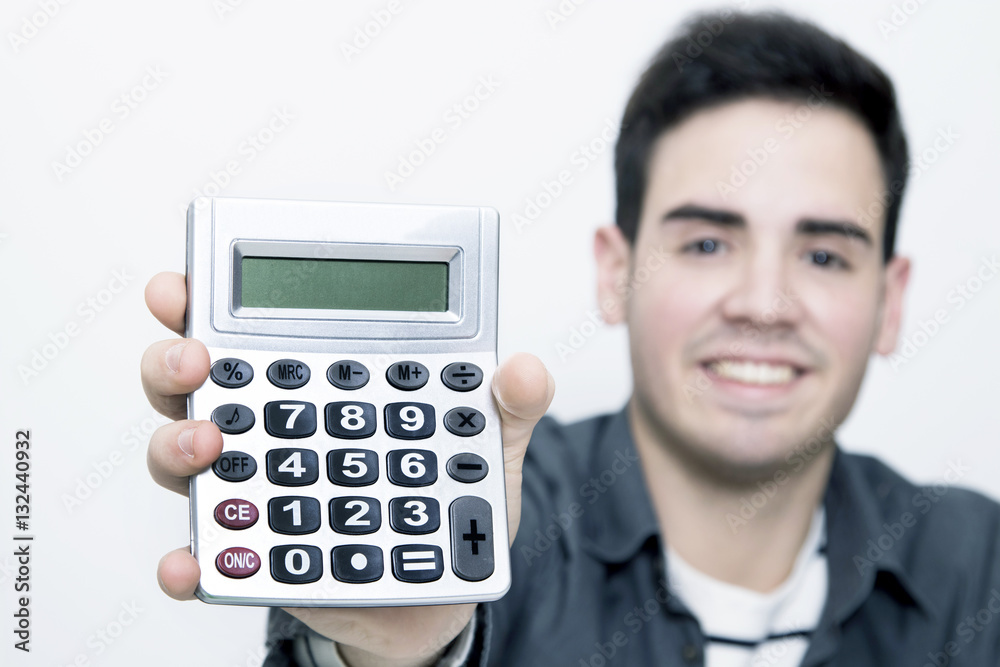 calculator in first plane with man to the background smiling Stock ...