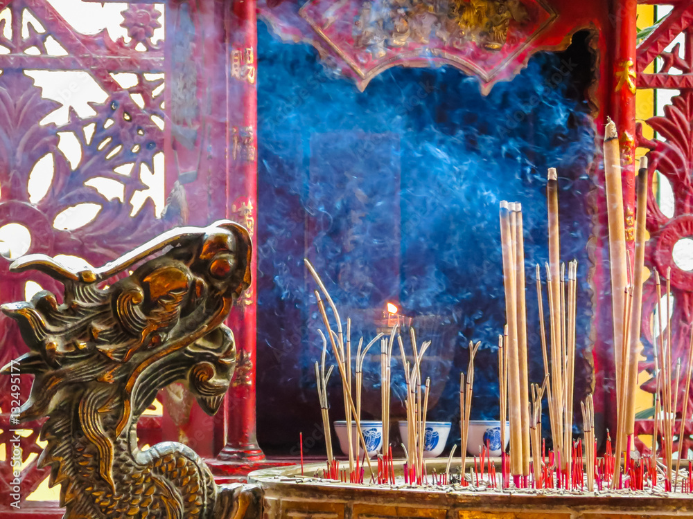 Burning incense sticks in a ancient Temple. Chinatown, Kuala Lumpur ...
