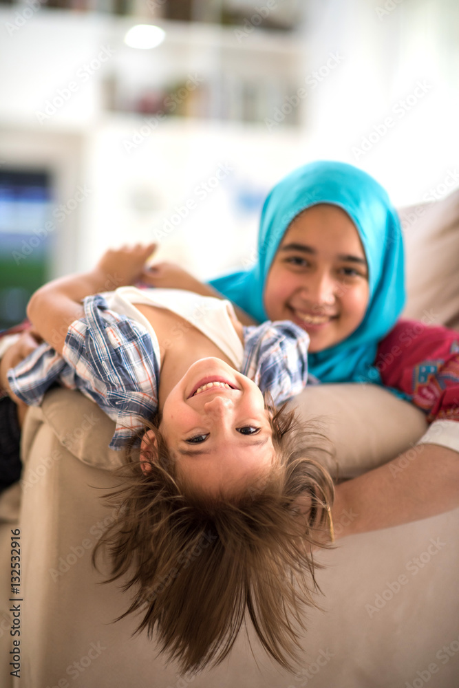 Happy muslim family at new modern home Stock Photo | Adobe Stock
