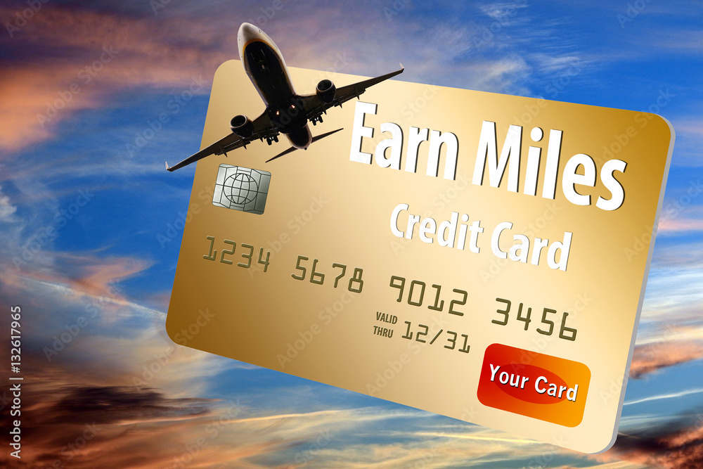 Credit card that offers air mile rewards is seen with a jet plane and ...