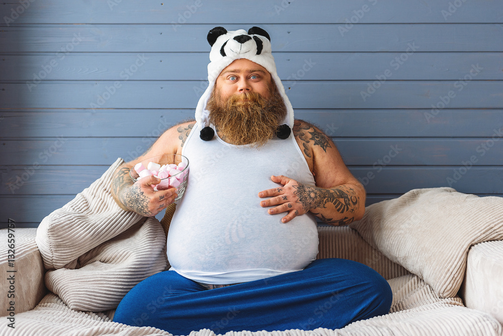 Man likes eating sweet food foto de Stock | Adobe Stock
