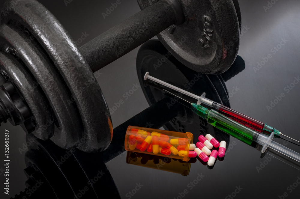 Doping in sport and steroid abuse concept with a dumbbell, a bot Stock ...
