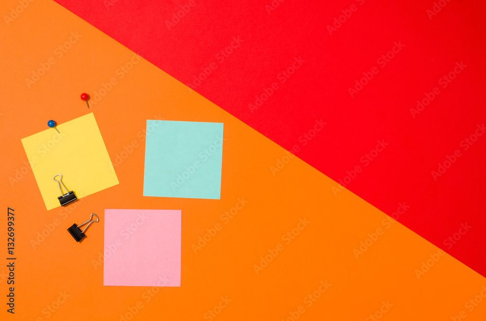 Sticky notes reminder on colorful office table or desk seen from above ...
