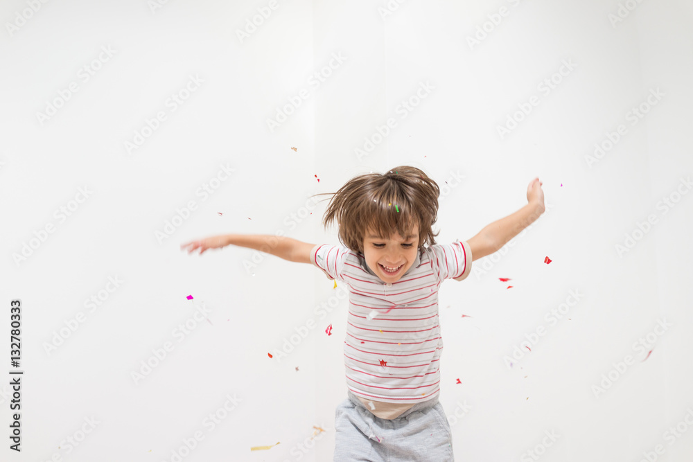 Cute little boy celebrating for party on white wall copy space Stock ...