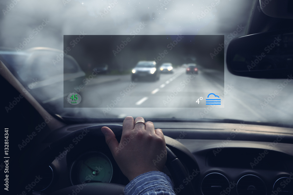 Modern car equipped with electronics and display on the glass Stock ...