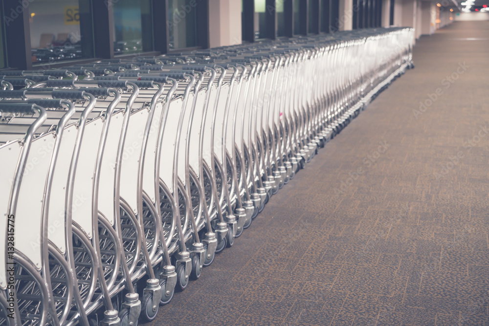 luggage carts at airport terminal . ( Filtered image processed v Stock ...