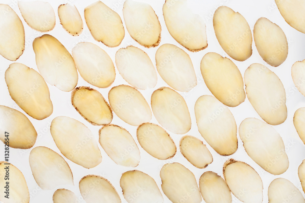 Backlit slices of raw potato, abstract textured background Stock Photo ...