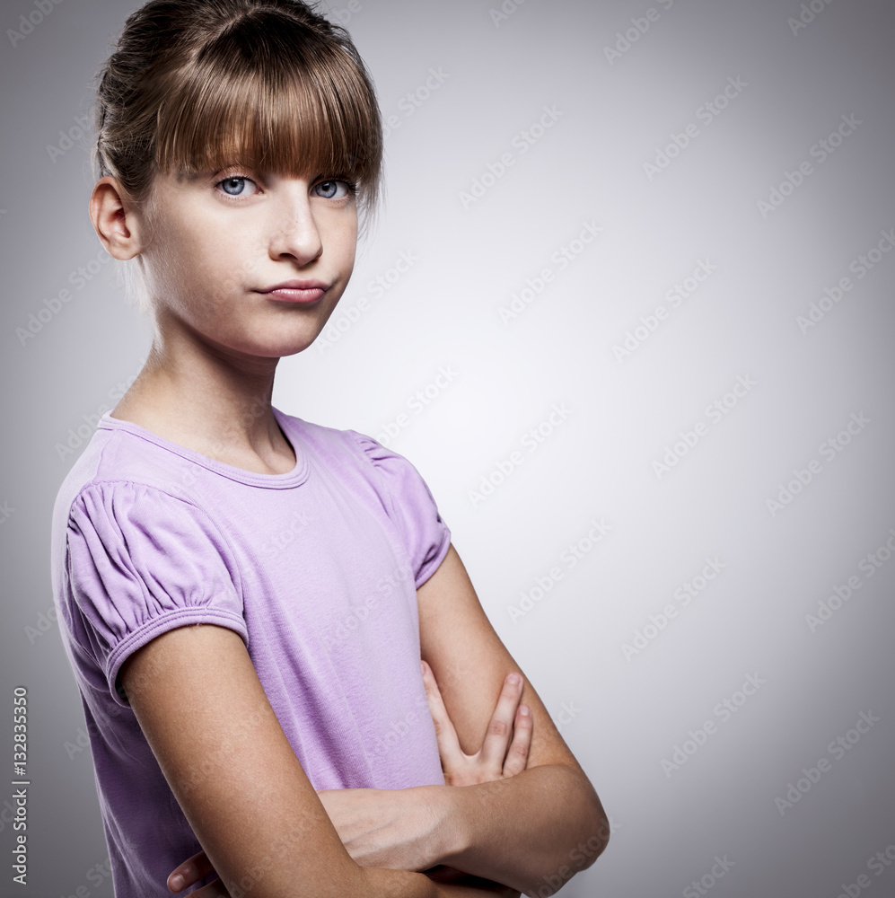 Grumpy Girl Posing Stock Photo | Adobe Stock