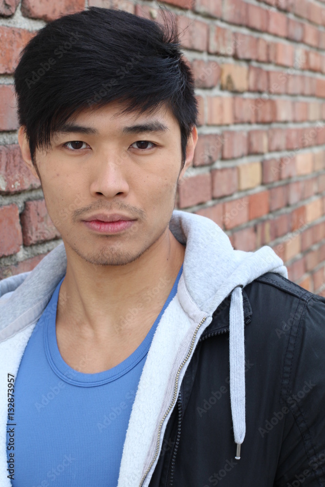 Attractive Asian man close up portrait foto de Stock | Adobe Stock