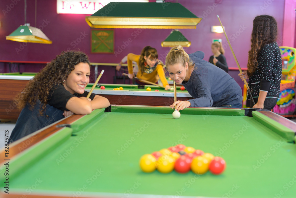 Women playing pool Stock Photo | Adobe Stock